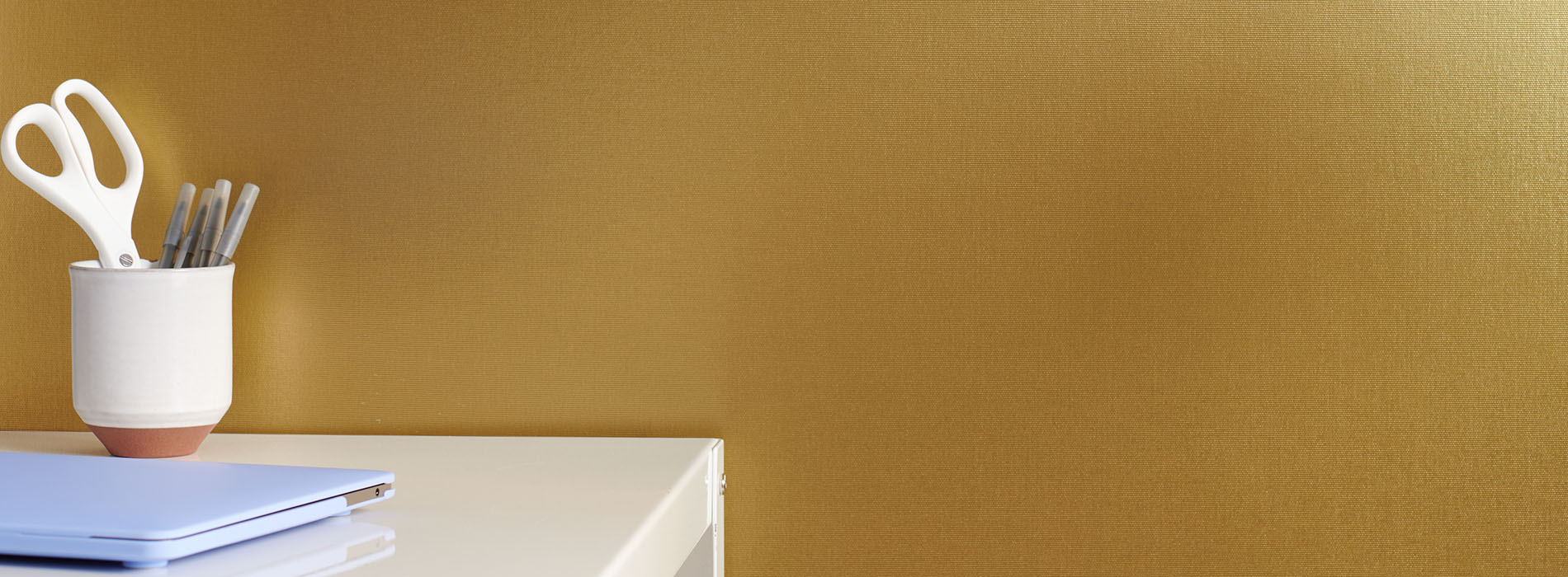 Formica DecoMetal® Laminate M6435 Woven Brass on office wall